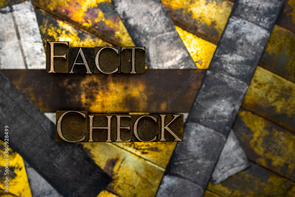 Fact Check text formed with real authentic typeset letters on vintage ...