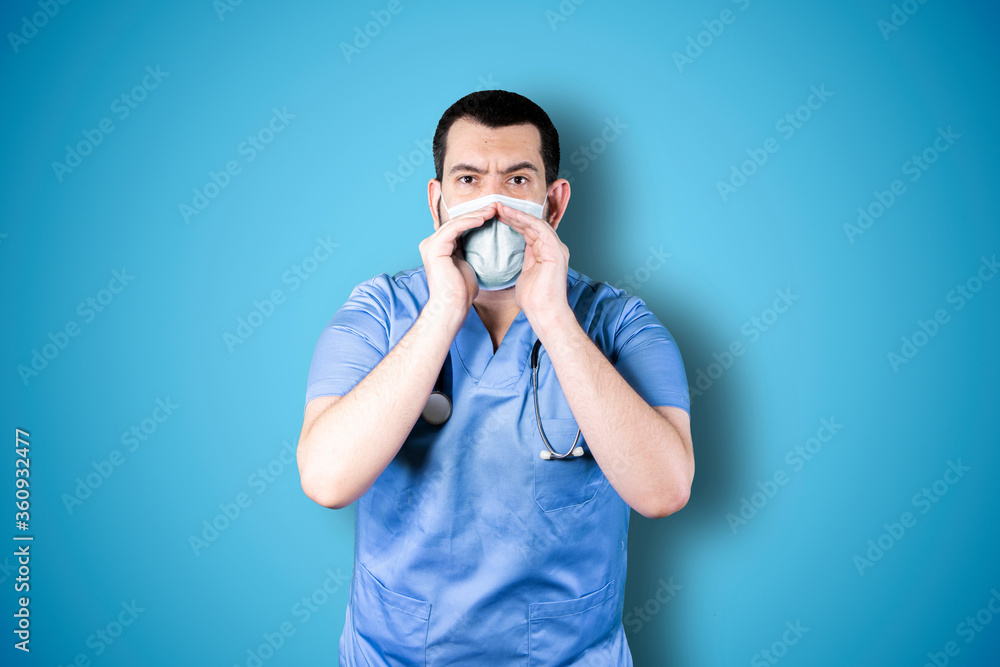 Doctor Screams, hatred, anger. Emotionally angry crying man screaming ...