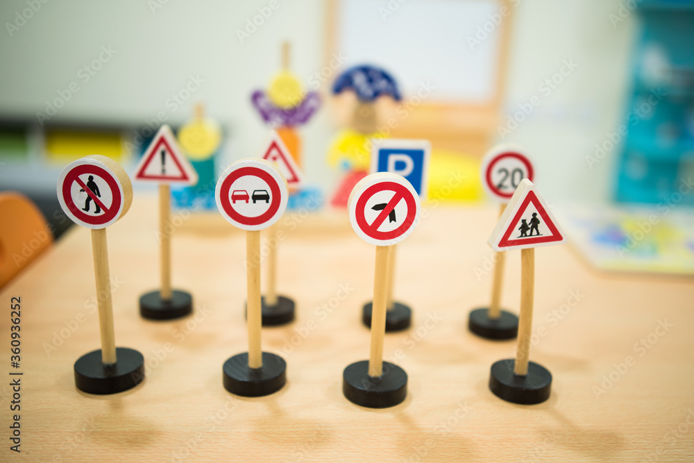 Little children`s road signs. Training children in road traffic ...