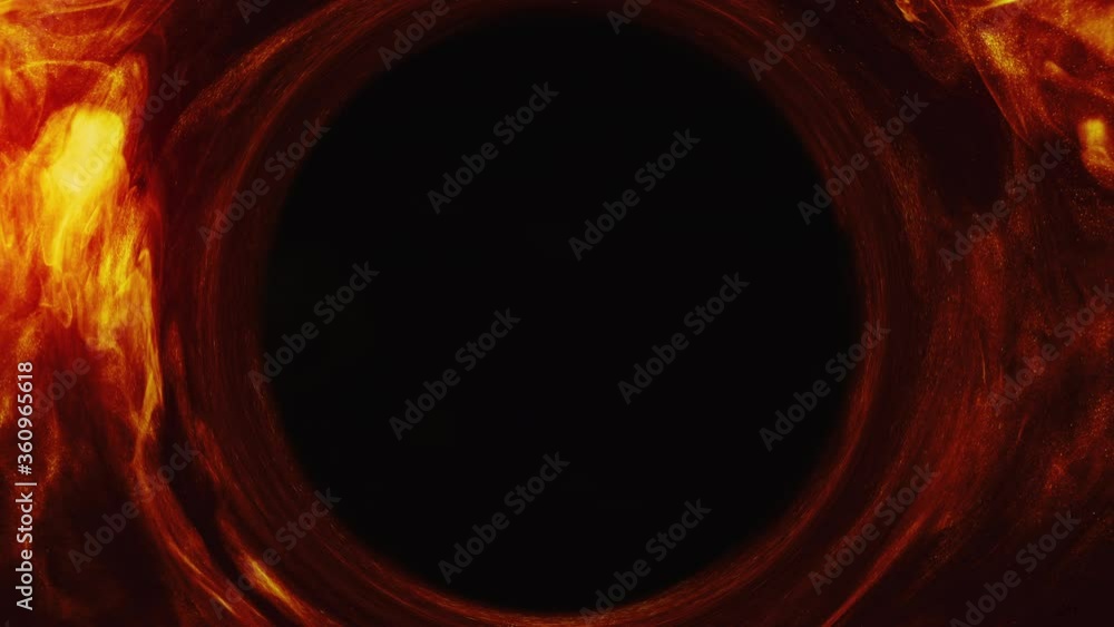 Smoke swirl. Solar eclipse. Black hole in flowing orange glitter fire ...