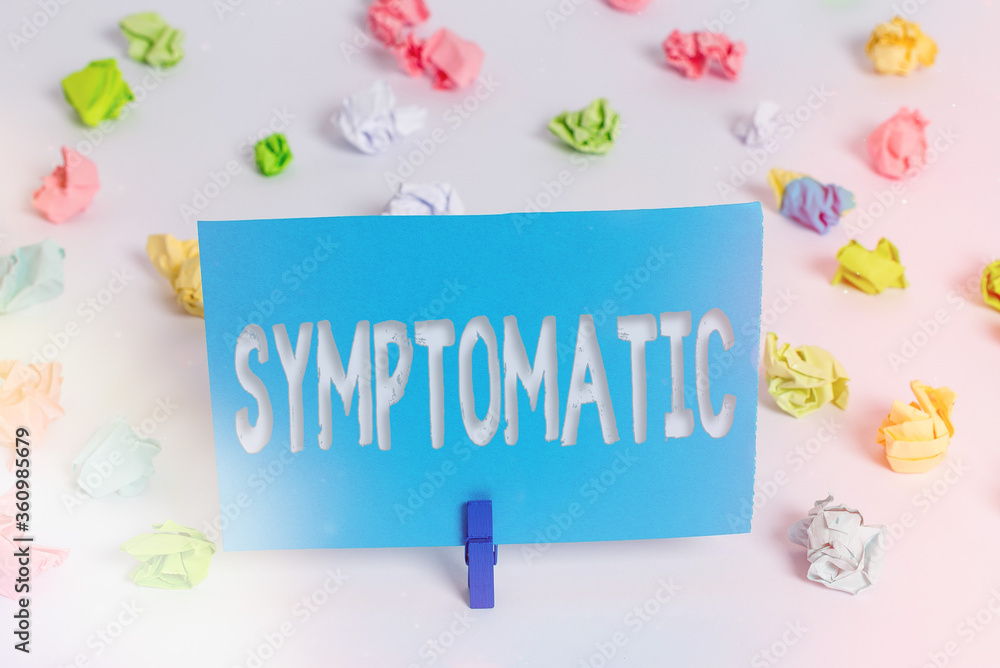 Writing note showing Symptomatic. Business concept for serving as ...
