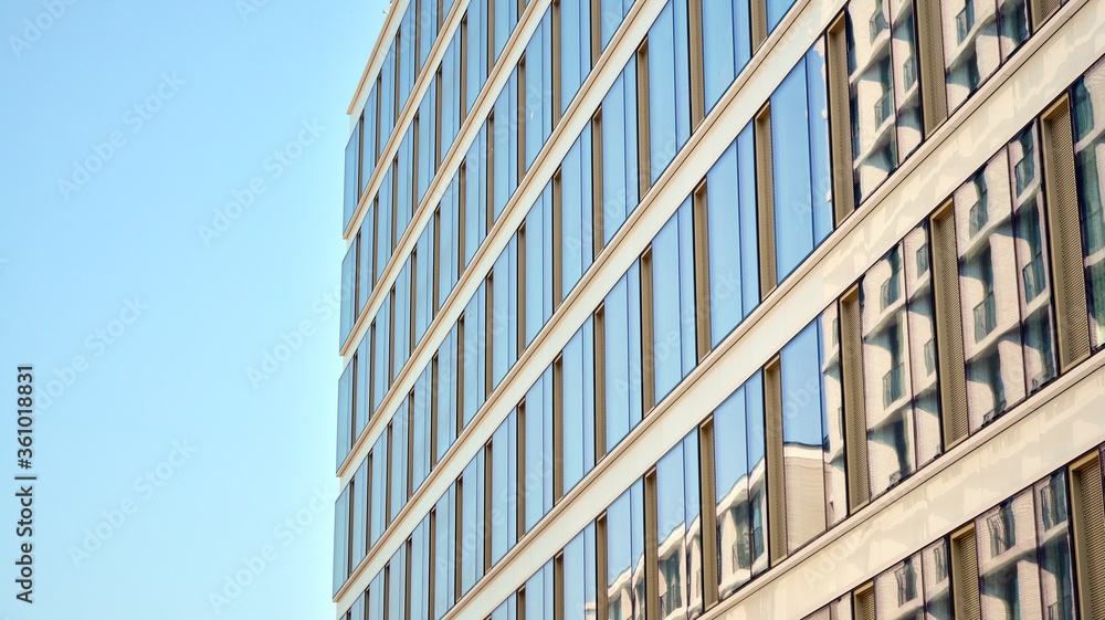 Facade texture of a glass mirrored office building. Fragment of the ...