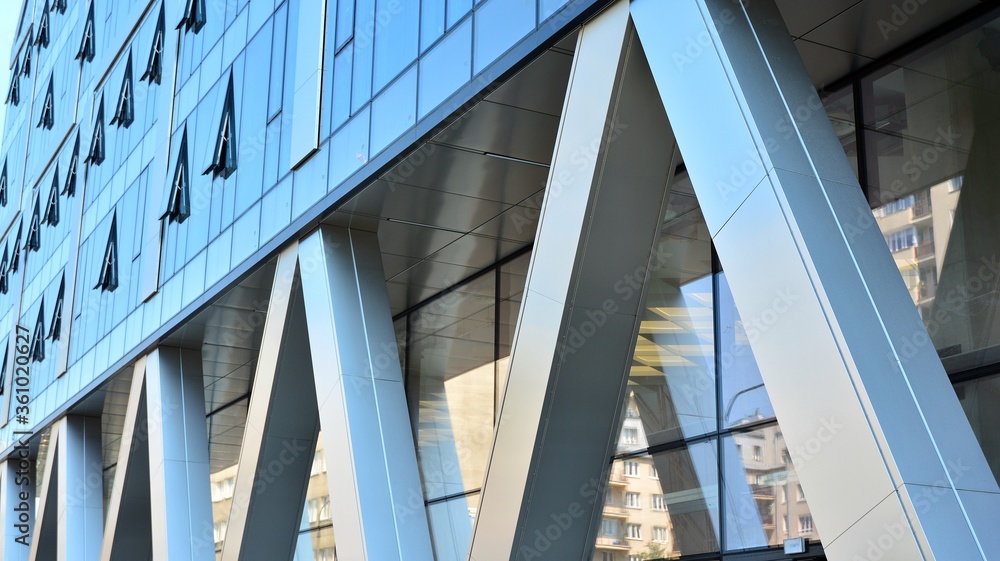 Combination of metal and glass wall material. Steel facade on columns ...