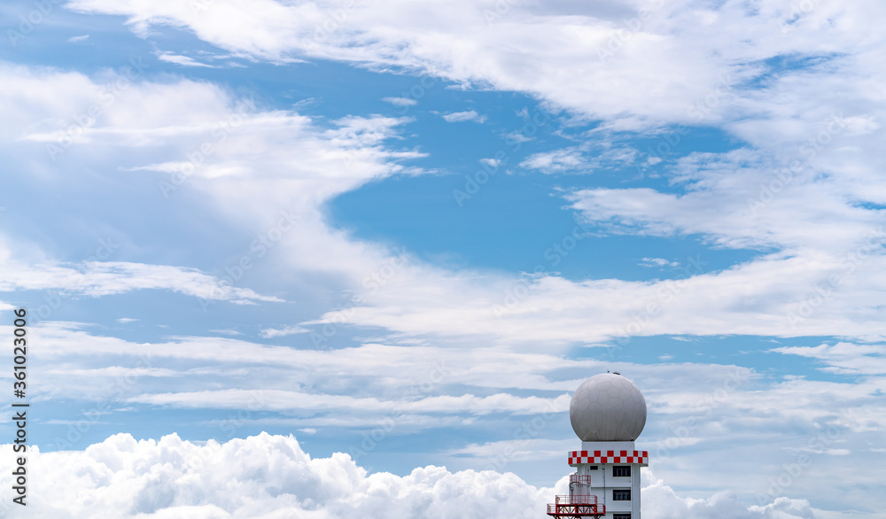 Weather observations radar dome station against blue sky and white ...