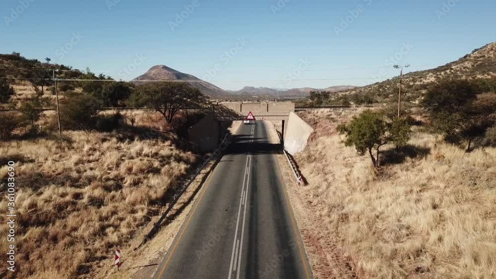4K aerial drone video of African savanna hills, railway bridge over B1 ...