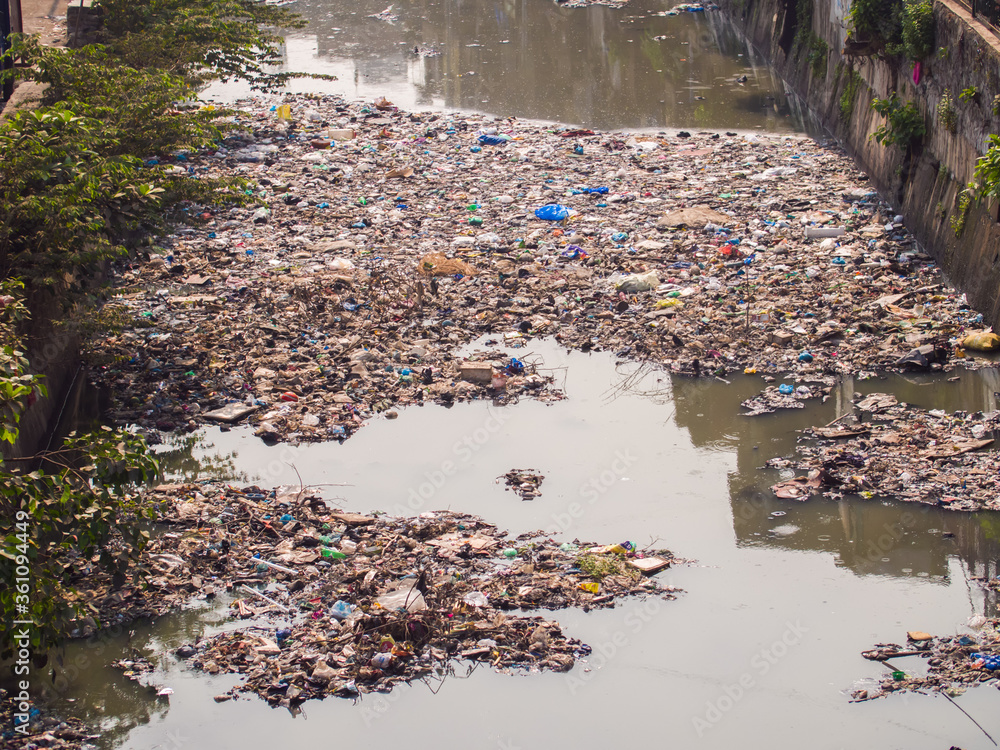Dirty river in Dharavi slums. Mumbai. India. Stock Photo | Adobe Stock