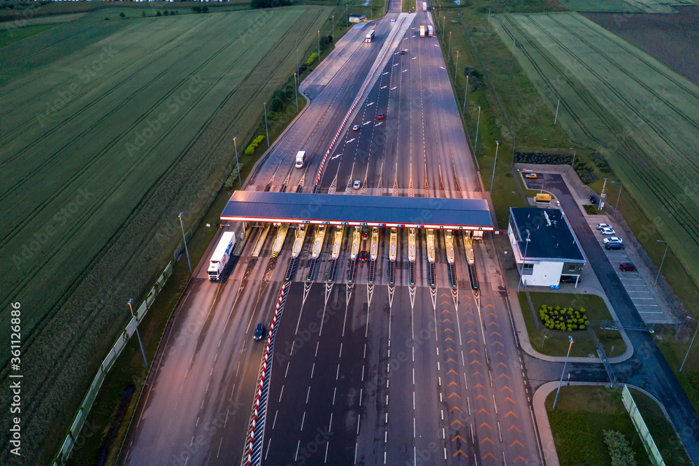 Car traffic transportation on multiple lanes highway road and toll ...