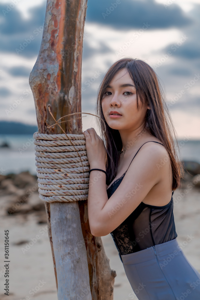 Young sexy woman in bikini enjoying summer vacation on beach relaxing ...