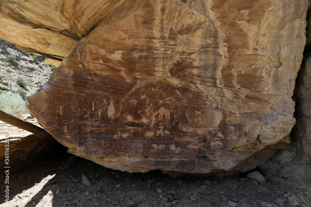 Ancient Native American Indian rock art petroglyph cave entrance Utah ...