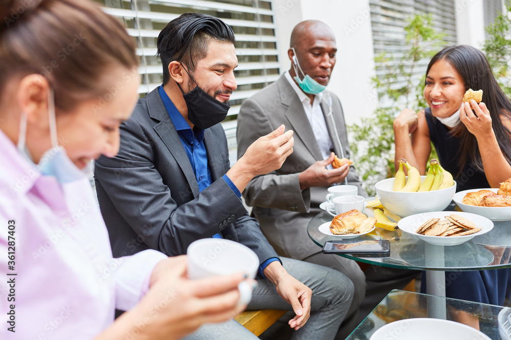 Business people have lunch together at the table Stock Photo | Adobe Stock