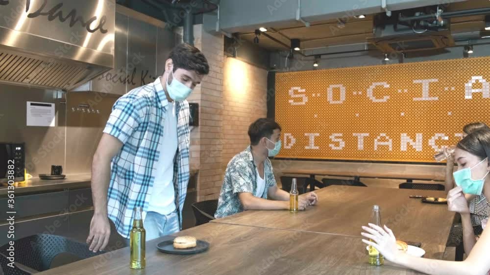 social distancing concept. Asian woman and asia people eating food ...