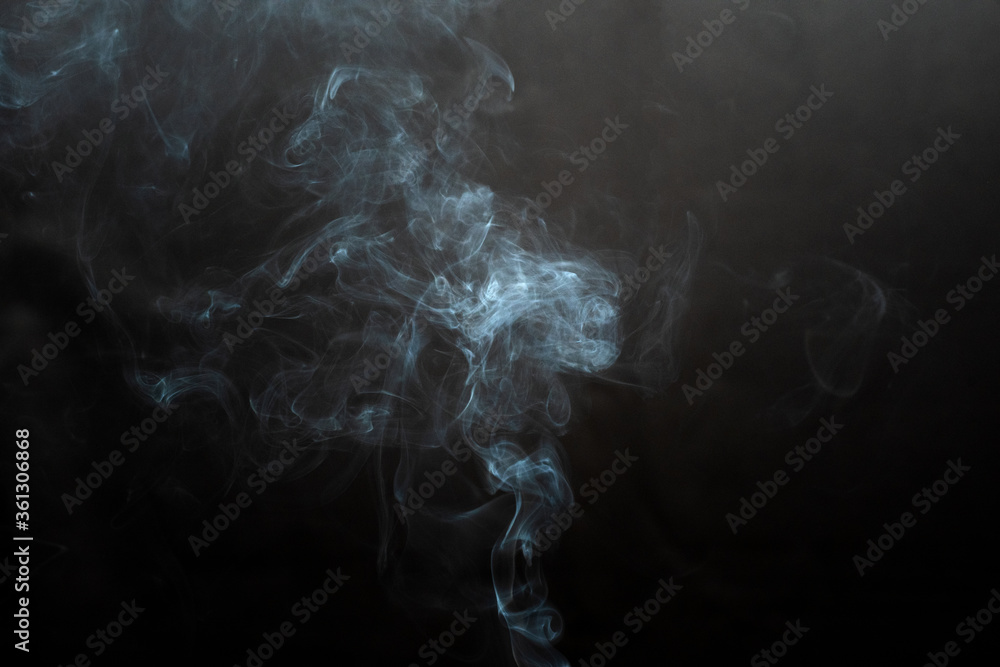 Figured smoke on a dark background. Abstract background, design element ...