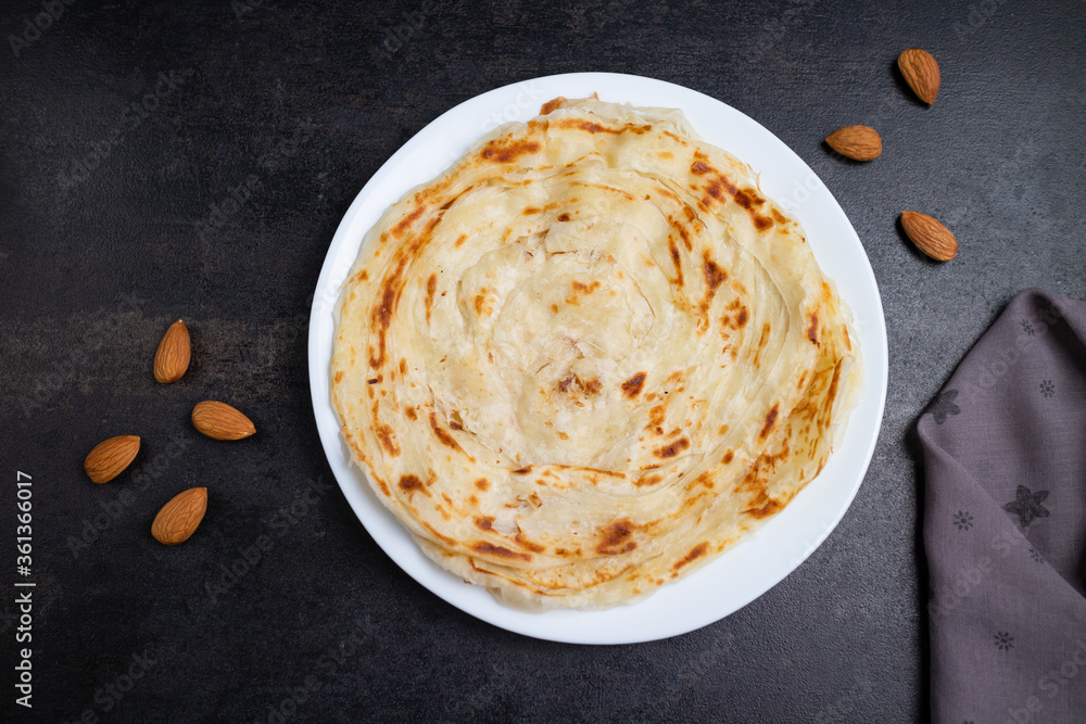 Kerala parathas / porotta / roti / parotta / barotta/ naan layered ...