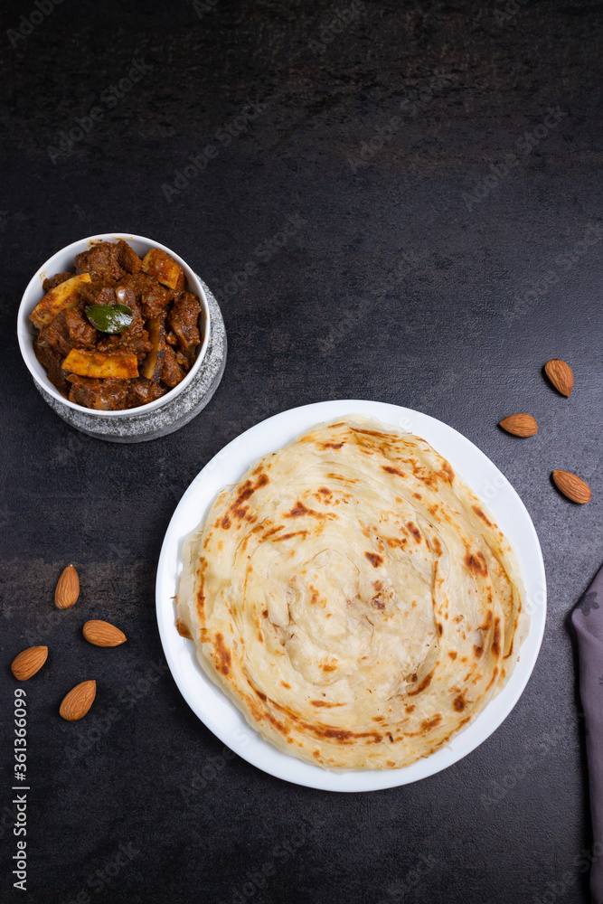 Kerala parathas / porotta / roti / parotta / barotta/ naan layered ...