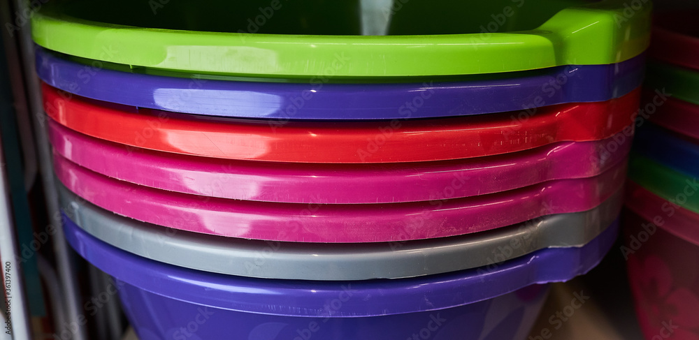 multi-colored plastic buckets. multi-colored buckets made of plastic ...