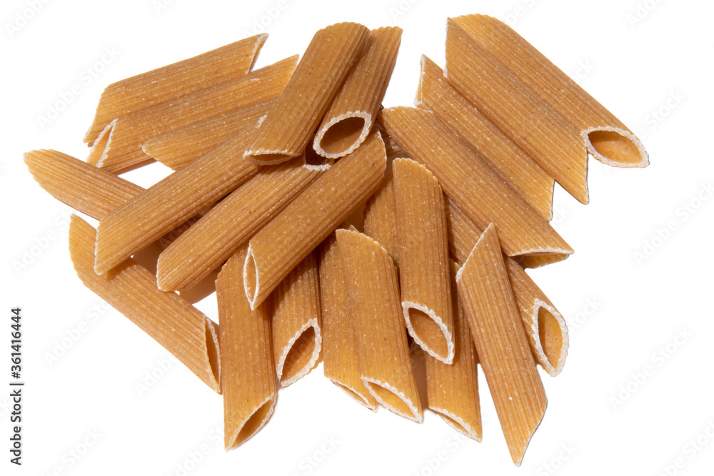 Pasta stack isolated on white. italian wholegrain penne lunch ...
