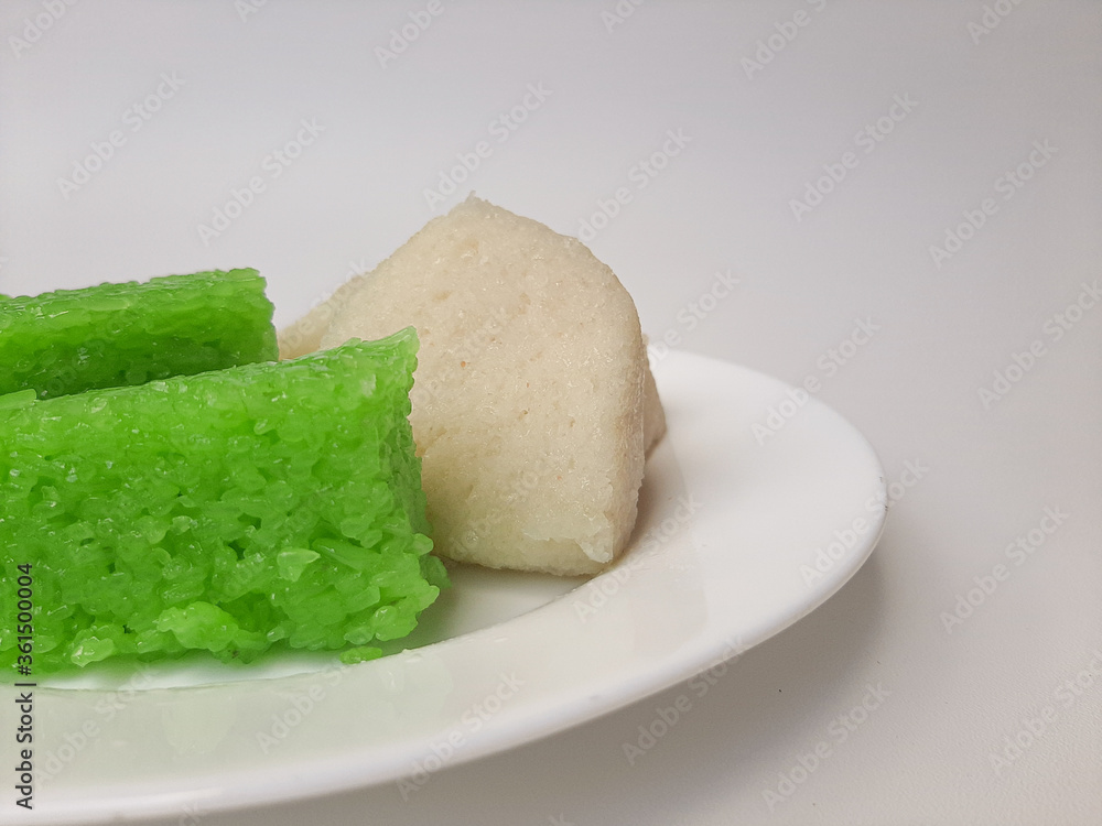 Jadah ketan (white) and wajik ketan (green), two traditional snacks ...