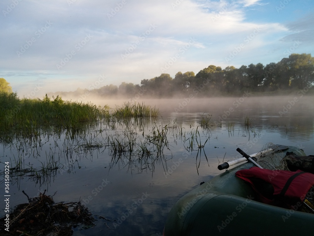 Morning fishing in Belarus on the Pripyat River. The first rays of the ...