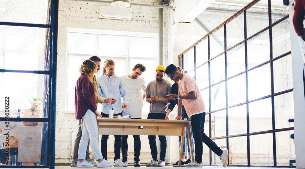 Foto Stock Crew of professional young designers planning project ...
