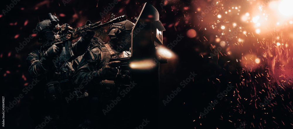 Portrait of a group of fighters of a special unit. They hide behind a ...