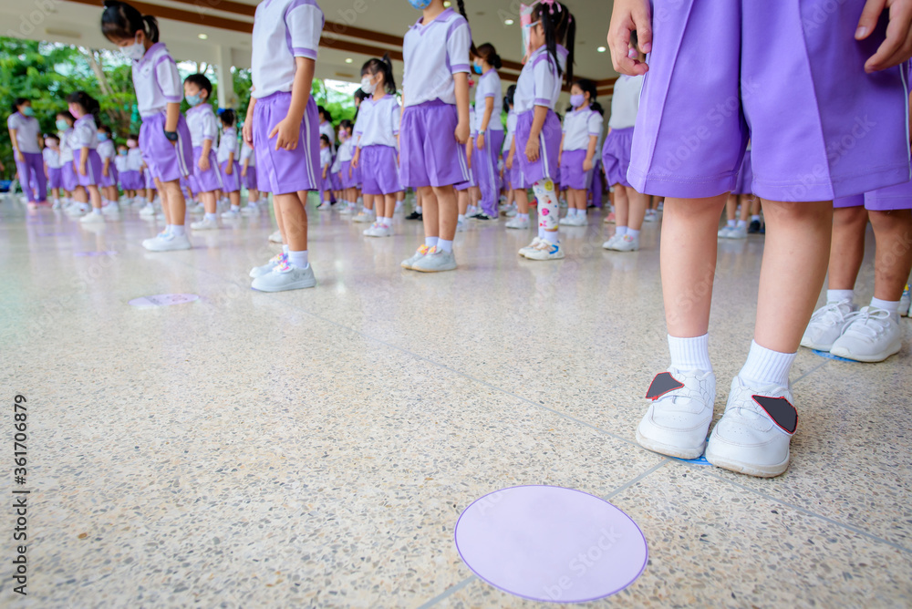 Picture of school children standing in line in kindergarten and ...