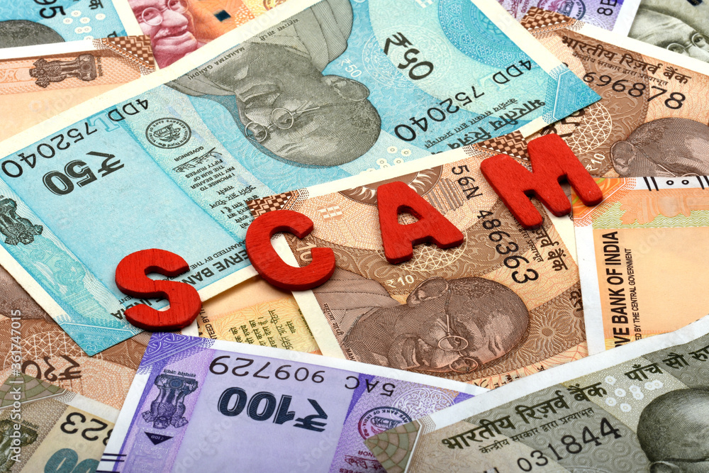 cam and money concept,Scam red alphabets on money background,Indian ...