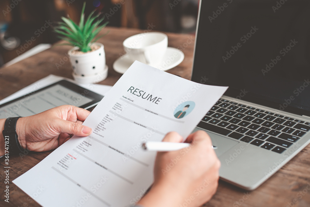 People are reviewing job applications before filling out their resume ...