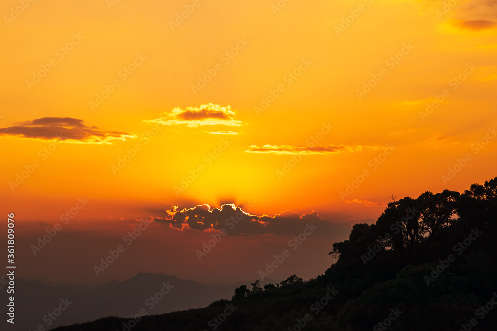 The peak of mountain with beautiful sunset at point view. Good day ...