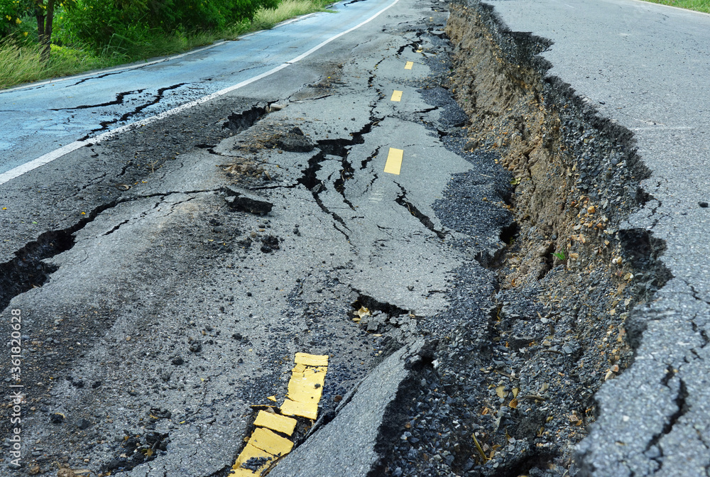 Broken asphalt road collapsed and collapsed due to drought Stock Photo ...