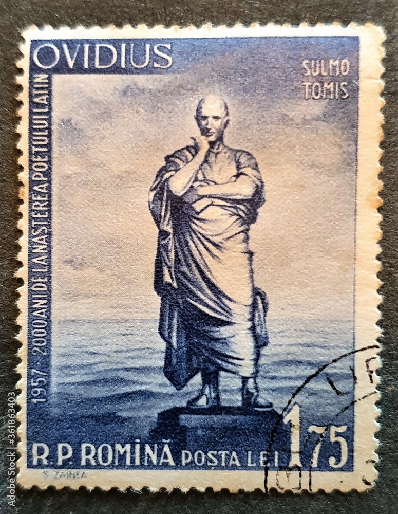 old Romanian stamp from 1957 with the image of the statue of the poet ...