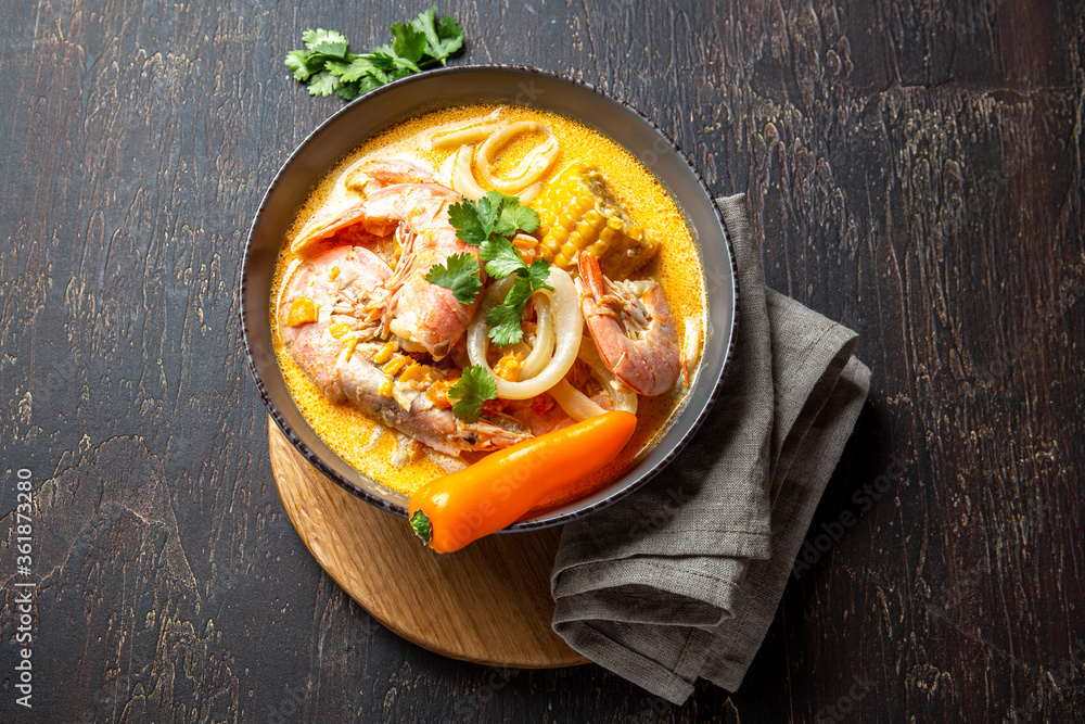 Peruvian seafood soup Chupe de Camarones in gray bowl, top view Stock ...