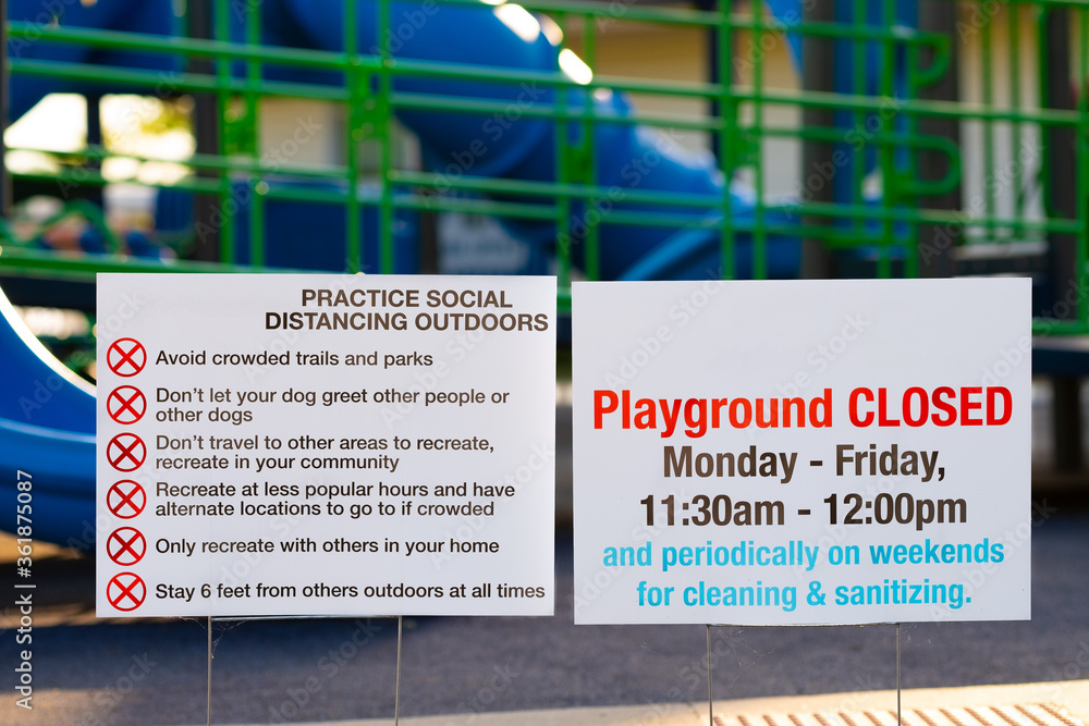 Foto de Sign on playground saying it will be closed for sanitizing ...