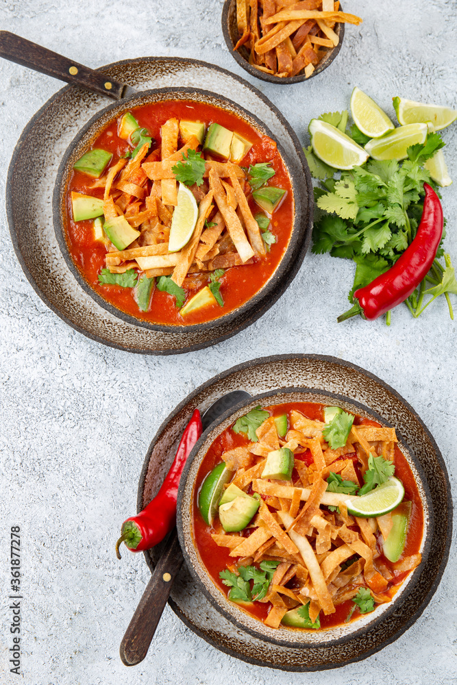 Aztec soup. Mexican sopa azteca with fried tortilla . Top view Stock ...