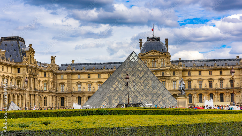 PARIS, FRANCE - JULY 28, 2017: Pyramid of Louvre Museum, the world's ...