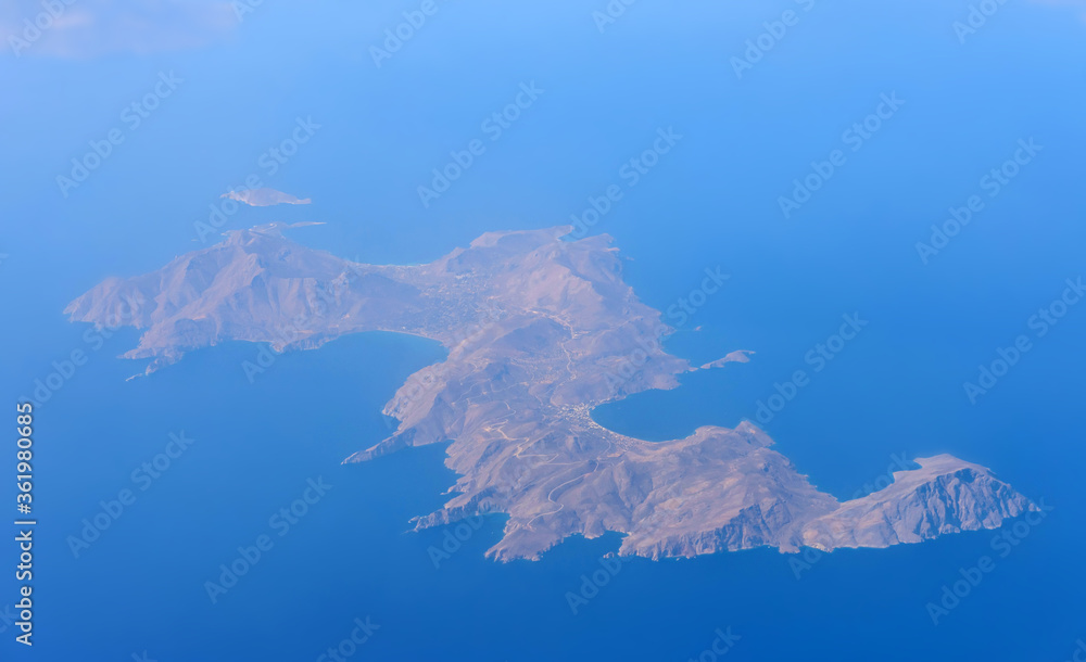 Tilos Island. The plane flies over the sea view from the window. Top ...