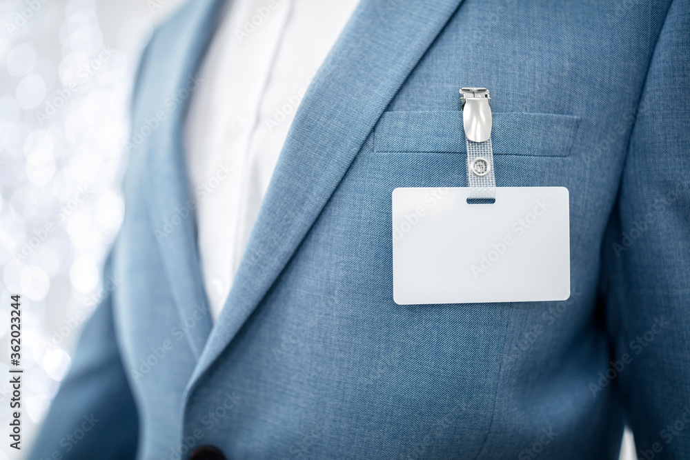 Blank security name tag on businessman suit pocket Stock Photo | Adobe ...