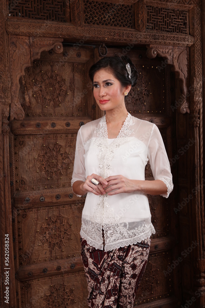 Beautiful woman wearing an elegant kebaya, kebaya is a traditional ...