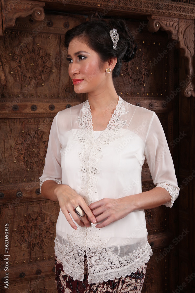 Beautiful woman wearing an elegant kebaya, kebaya is a traditional ...