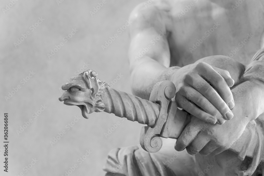 Black and white photo showing in detail a marble sculpture of a ...