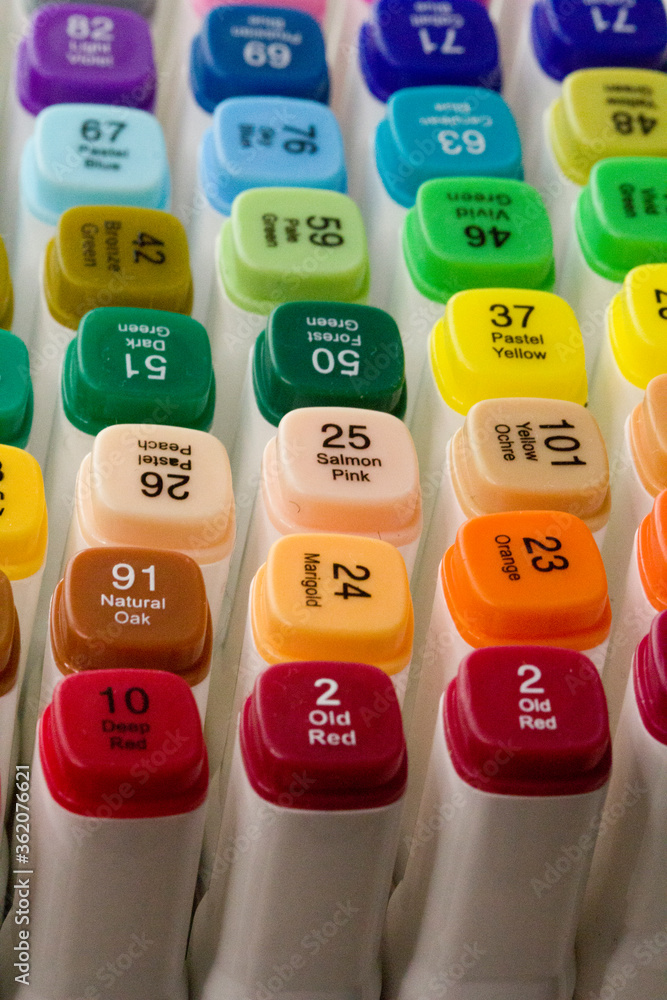 Set of bright multi-colored felt-tip pens or markers with designation ...