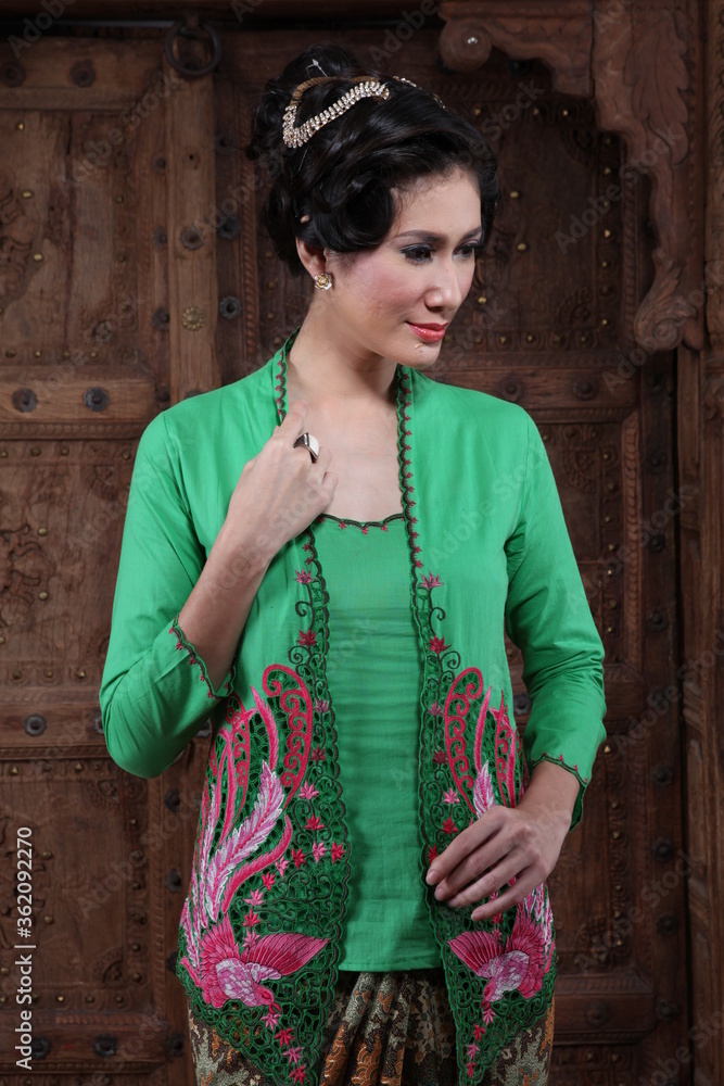 Beautiful woman wearing an elegant kebaya, kebaya is a traditional ...