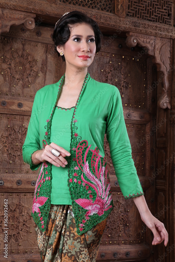 Beautiful woman wearing an elegant kebaya, kebaya is a traditional ...