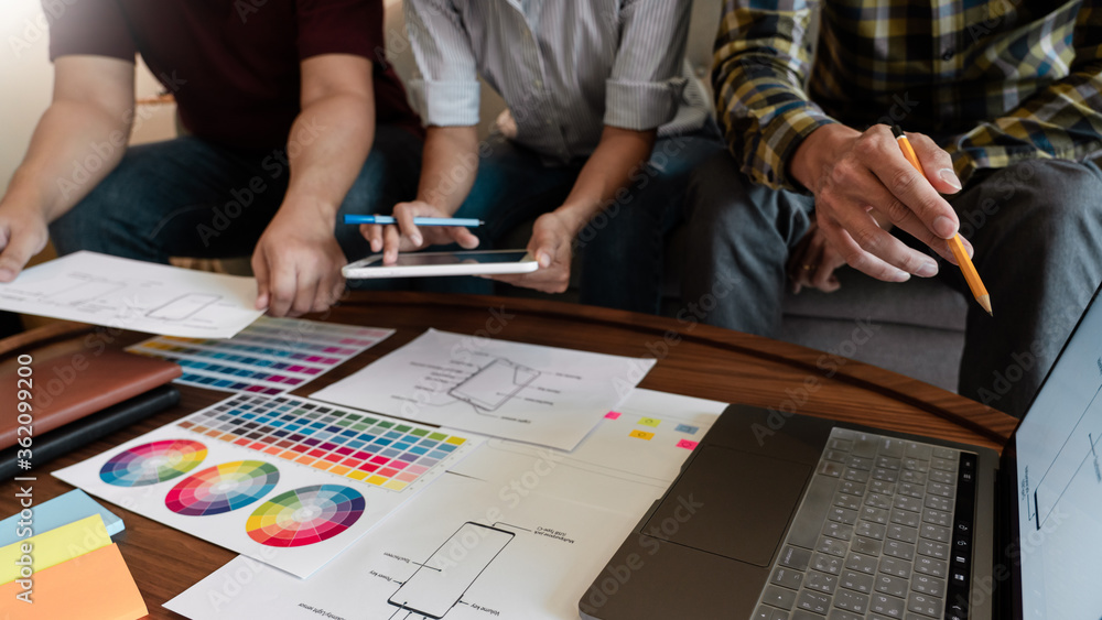 Creative team analyzing prototype products for product design in Co ...