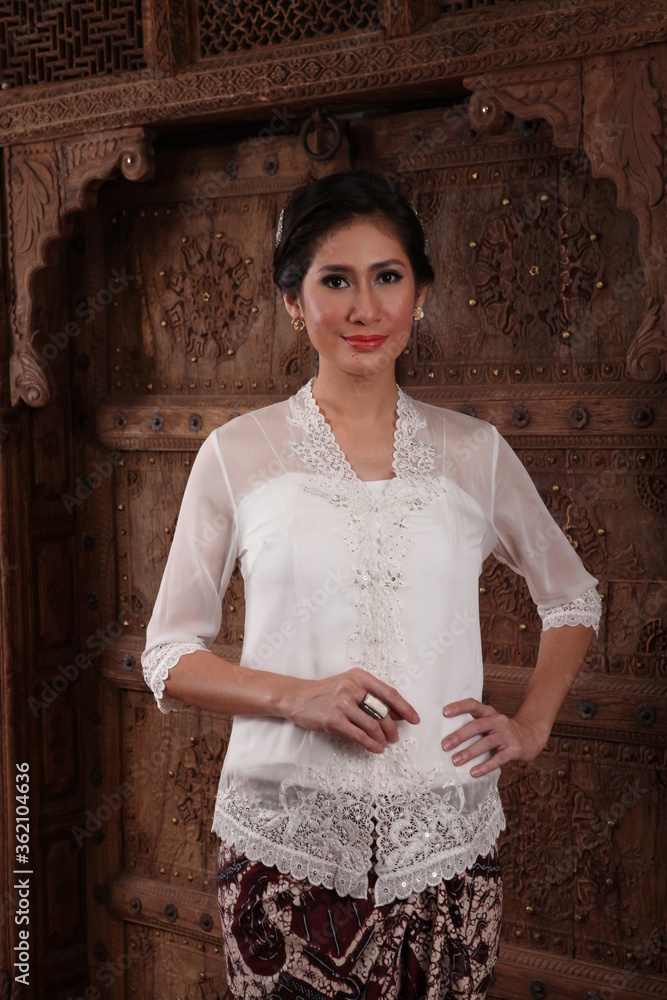 Beautiful woman wearing an elegant kebaya, kebaya is a traditional ...