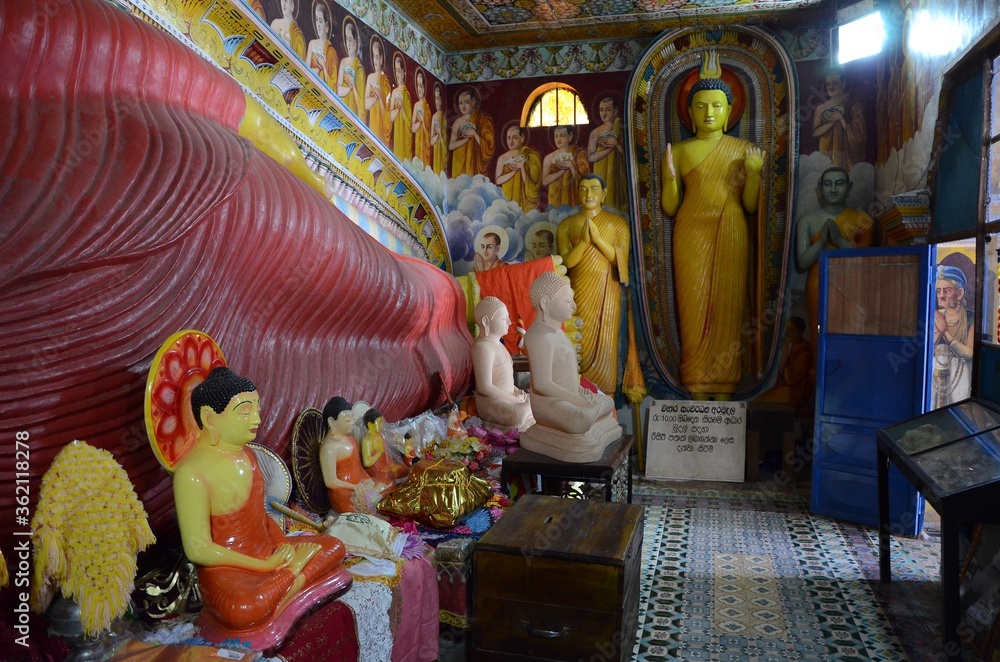 Sacral statues in the rock temple of the Isurumuniya Monastery ...