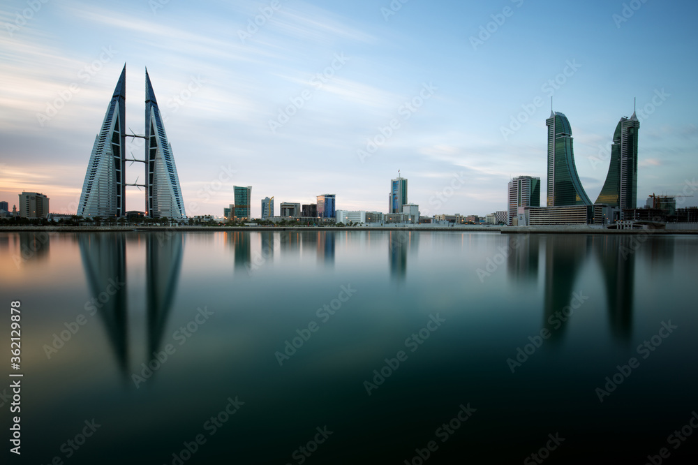 The Bahrain skyline on cloudy day, a long exposure image showing ...