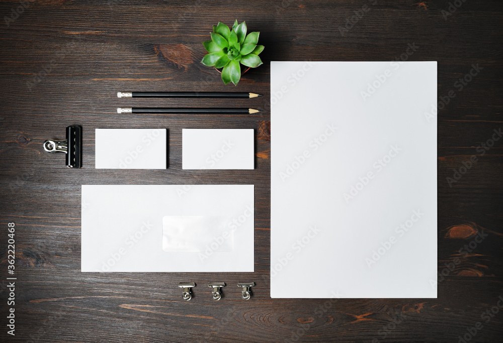 Blank stationery set on wood table background. Envelope, business cards ...