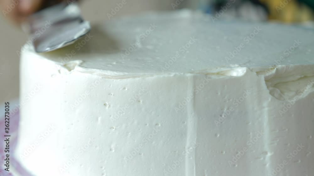 Children learn decorate cake by hand stuffing and garnish on rotate ...