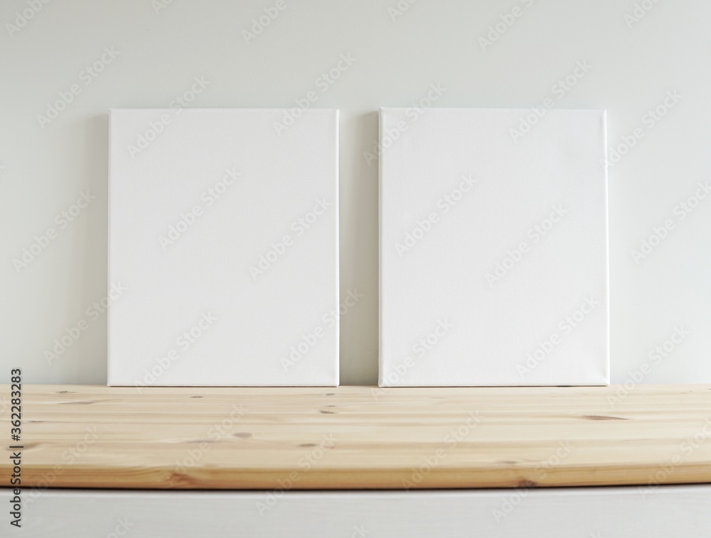 Two vertical canvas frames mockup, set of two mockups, minimal interior ...