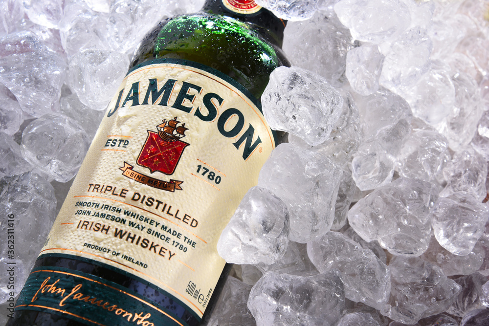 Bottle of Jameson Irish whiskey in crushed ice Stock Photo | Adobe Stock